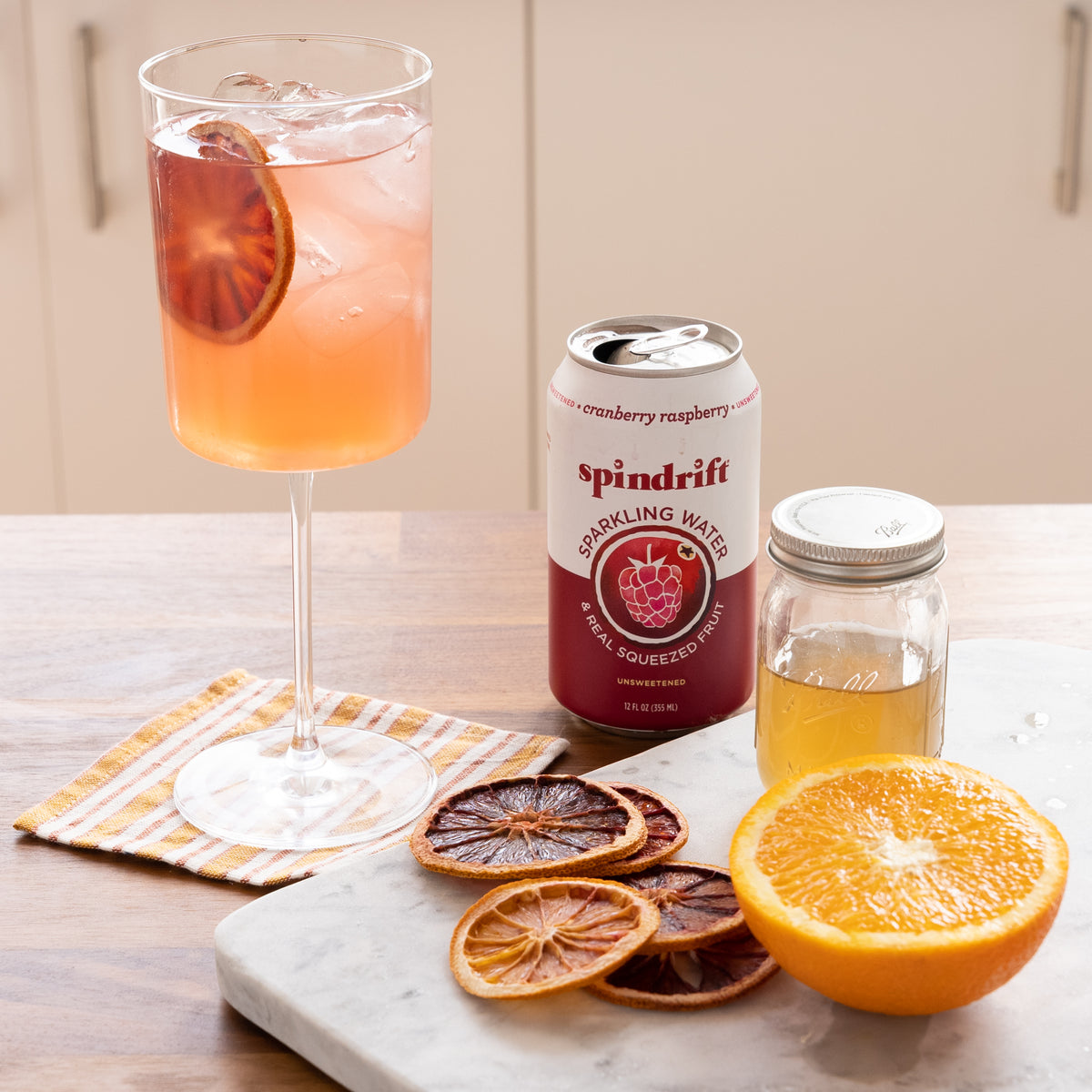 Ginger + Orange Cranberry Raspberry Spritz Recipe | Spindrift